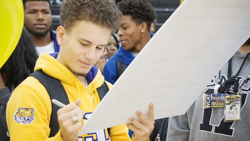 Photo feature: ESJH students sign for college | L'Observateur