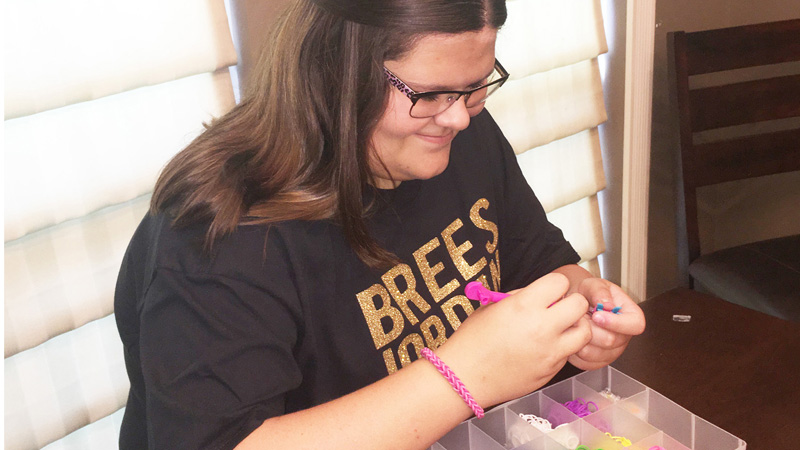 Alyssa Hebert, 15, crafts braided bracelets to sell in fight against ...