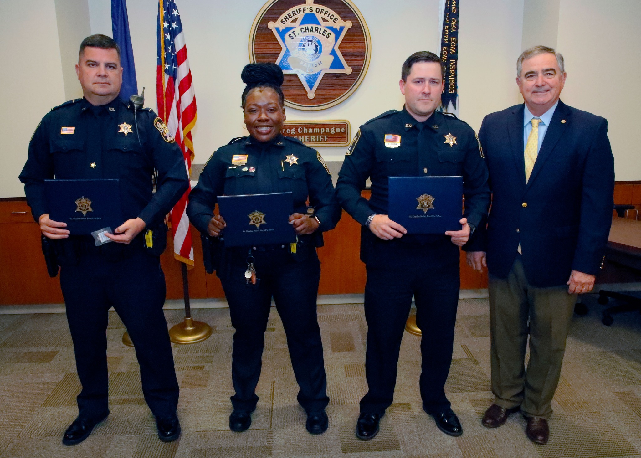 Sheriff Greg Champagne presents several employee awards | L'Observateur